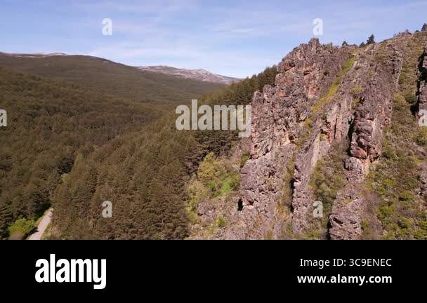 Mountain tops covered in rock formations that look like dragon scales ...