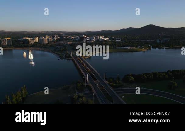 From above, a drone captures the stunning cityscape of Canberra ...