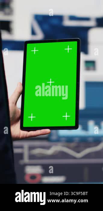 Vertical Video Entrepreneur holds tablet with copy space screen and ...