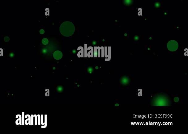 Green glowing particles float gently on transparent alpha channel ...