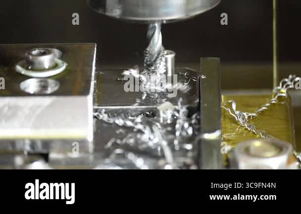 Close up scene canned cycle operation of the tapping process on CNC ...