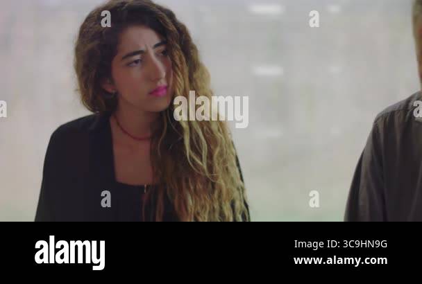 Middle aged man shares emotionally during therapy session, speaking ...