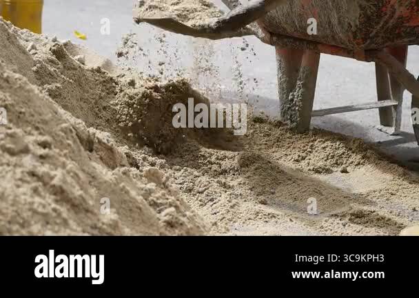 Workers using sand wheelbarrow construction Stock Videos & Footage - HD ...