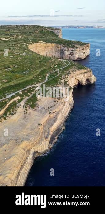 This aerial exploration showcases the magnificent cliffs of Malta ...