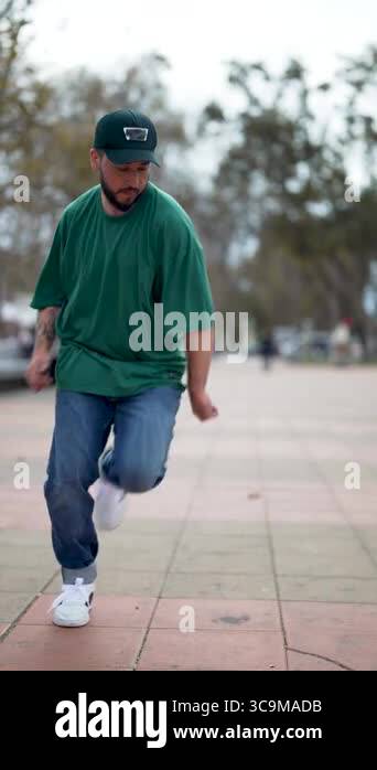 male latin American breakdancer performing on the street Stock Video ...