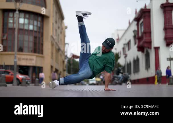 male latin American breakdancer performing on the street Stock Video ...