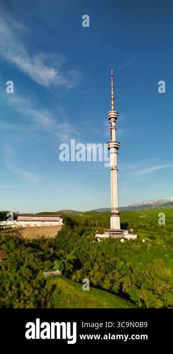 Vertical video Aerial drone reveal shot of symbol Almaty city high TV ...