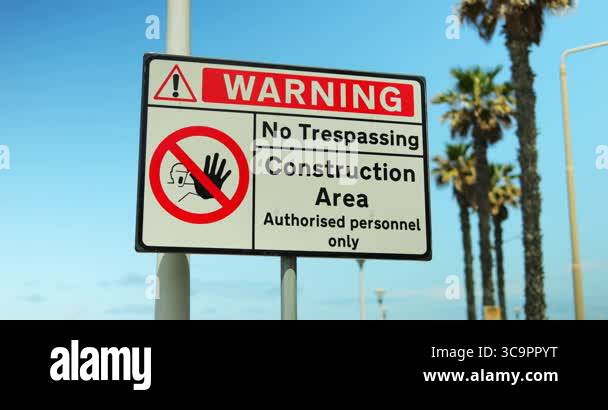 Warning sign indicating No Trespassing into Construction Area except ...