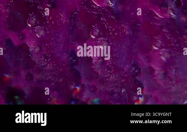 Neon fluid drip. Defocused falling glitter. Paint flow fragment purple ...