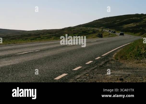 Empty road highway road in middle of nowhere medium zoom panning shot ...