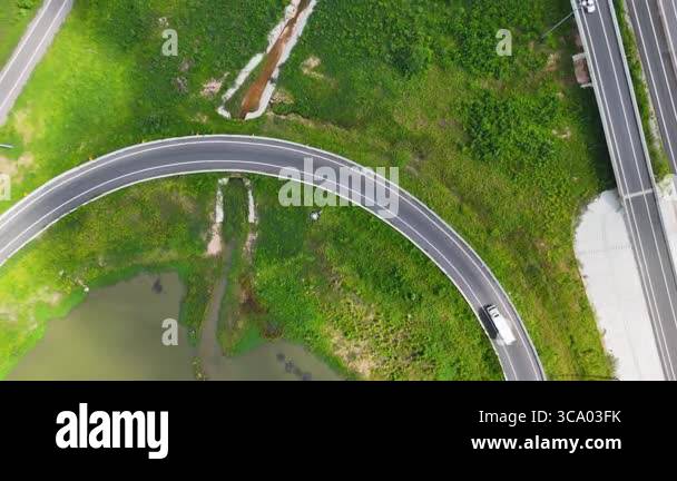 Aerial view drone footage of a complex bridge intersection where ...