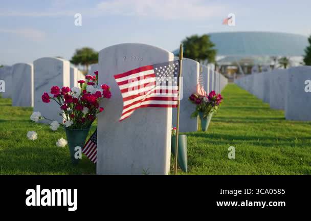 American army national cemetery with rows of white headstones decorated ...