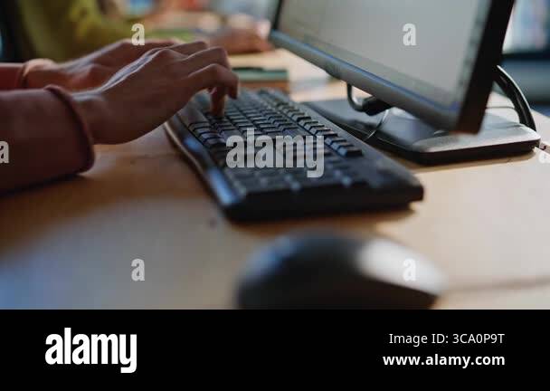 Manager hands entering data on keyboard preparing email for client ...