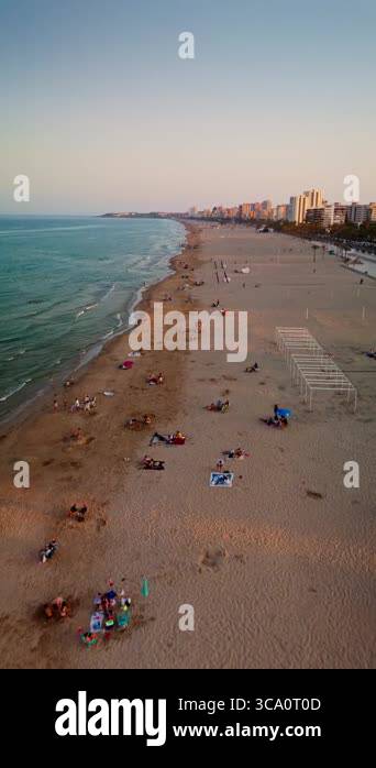 Cinematic aerial view of San Juan beach (Playa de Muchavista) in ...