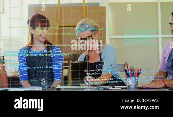 three colleagues collaborating in IT workshop around table with pencils ...