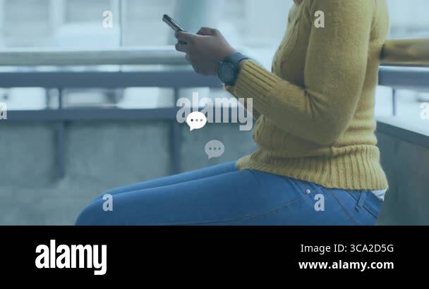 Masked woman holding phone on transit stop receiving graphic chat ...