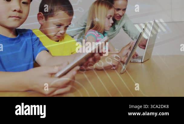 Three students tapping tablets while teacher placing laptop guiding ...