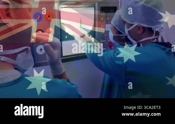 Surgical team examining chest X-ray in medical control room, showing ...