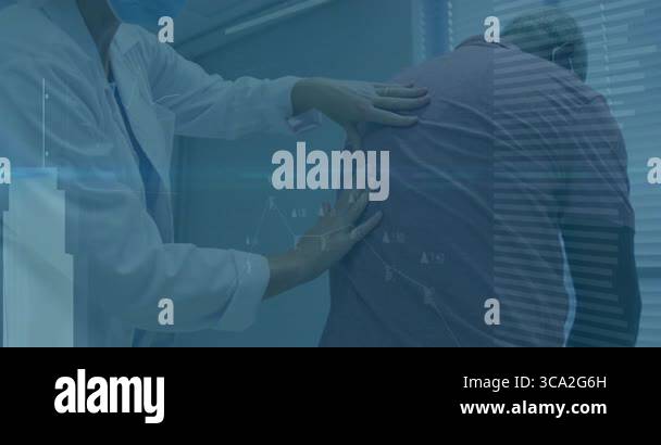 female doctor palpating patient back at exam table in medical room ...