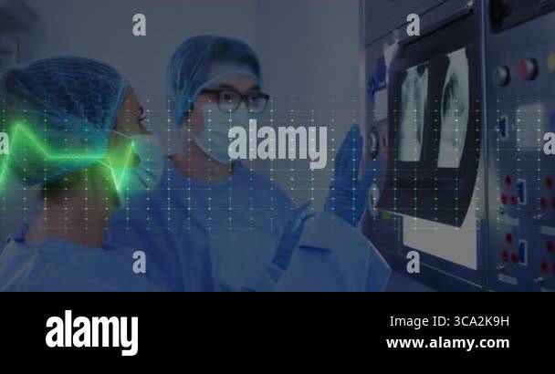 Medical professionals examining chest scans in hospital scan room ...
