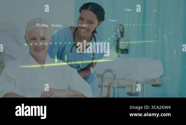 Nurse monitoring floating chart graphic while senior patient receiving ...