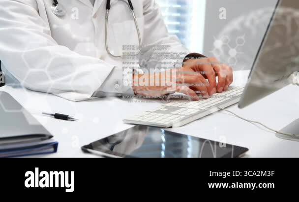 Male doctor typing on keyboard in medical office, displaying floating ...