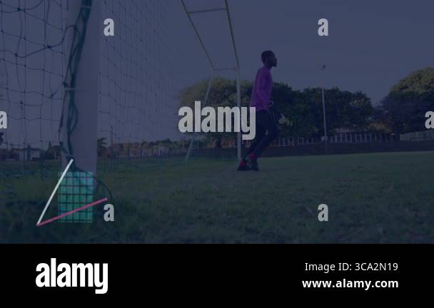 Goalkeeper crouching by soccer goal, technology overlays showing teal ...