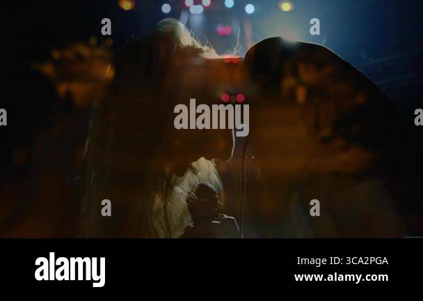 female singer performing on dark concert stage, with animated music ...