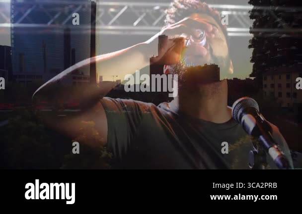 Male presenter adjusting in-ear monitor on stage while technology ...