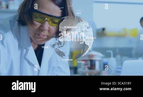 Woman scientist studying holographic globe in technology lab ...