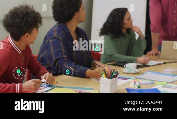 designers collaborating around table, with floating green eco-icons ...