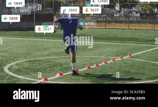 Soccer player jumping over cones on sports training field, featuring ...