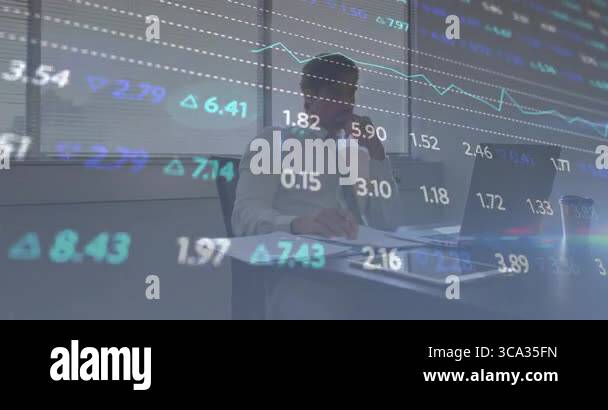 Financial analyst reviewing reports at desk, showing floating stock ...