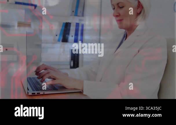 Female scientist wearing lab coat typing on laptop in lab, with ...