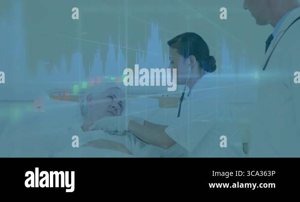 Mid adult nurse examining patient in hospital room, with digital ...