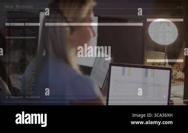 female IT professional typing code at workstation, showing terminal ...