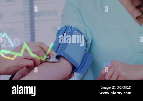 Woman wearing blouse measuring blood pressure, showing animated line ...