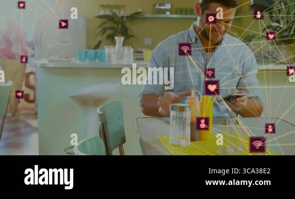 man sipping coffee while checking smartphone in modern kitchen, showing ...