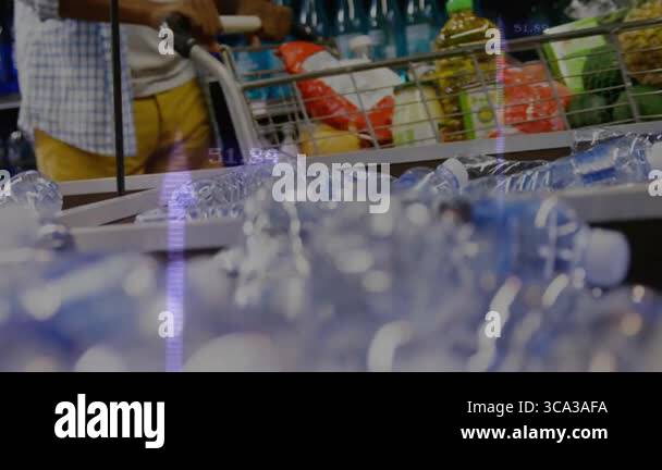 Man guiding shopping cart at retail checkout, with animated price tags ...