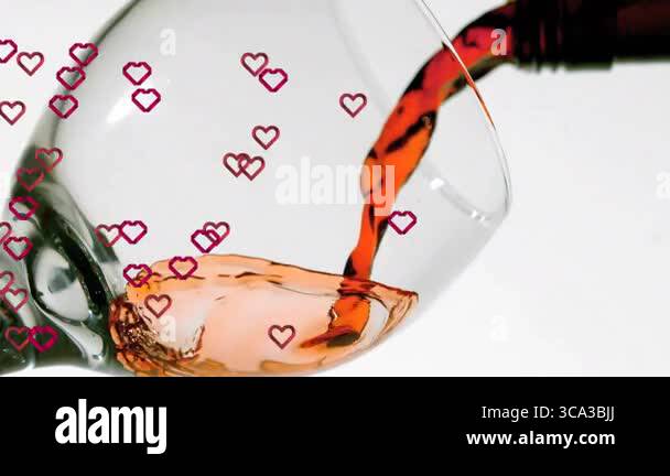 Red wine pouring into tilted glass in studio scene, with heart overlays ...