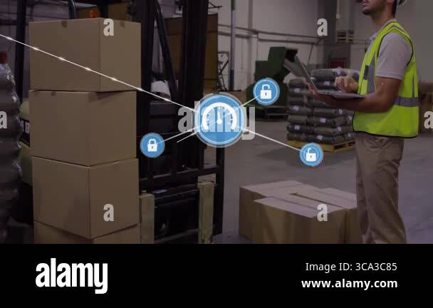 Warehouse worker checking load on tablet and activating gauge and lock ...