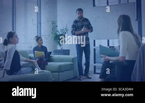 Presenter raising hand and outlining key points on whiteboard in ...