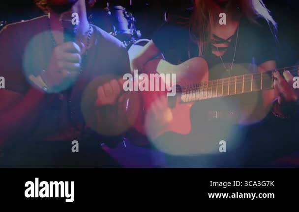 Performing duo singing and playing guitar on stage, featuring animated ...