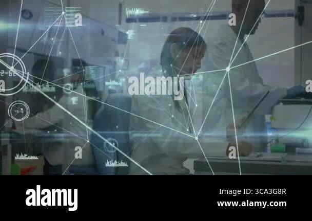 Scientists collaborating in high-tech research lab, engaging ...