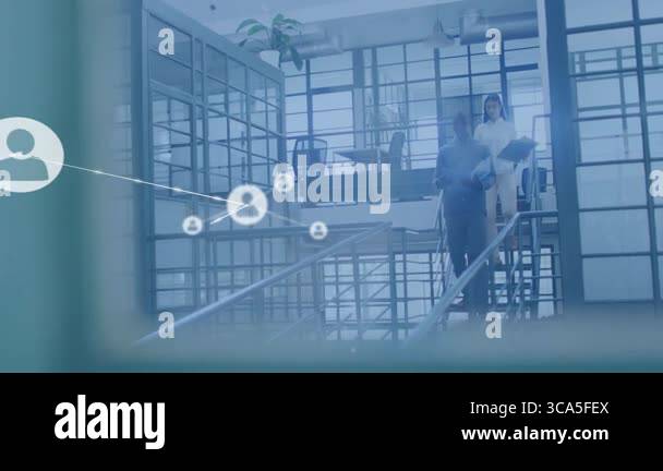 business professional exploring network graph in lobby, with animated ...