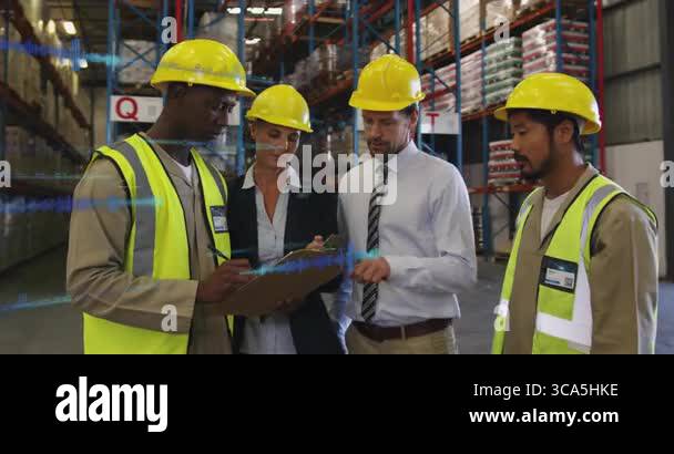 warehouse staff and supervisors examining clipboard by pallet racks ...