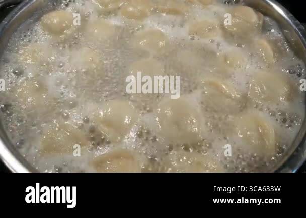 Boiling Dumplings in Hot Water: Cooking Process for Delicious Homemade ...