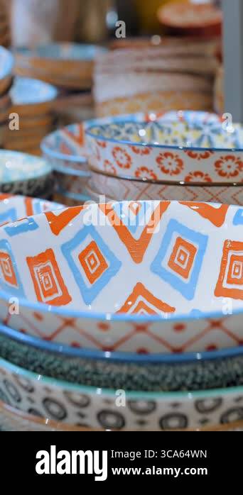 Sale of dishes in the store. dishes. multi-colored ceramic plates. sets ...