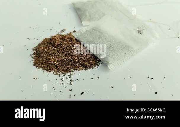 Tea dregs on a white background. Tea dregs can be an organic fertilizer ...