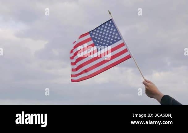 American Flag waving in golden hour light with celebrating 4th of july ...